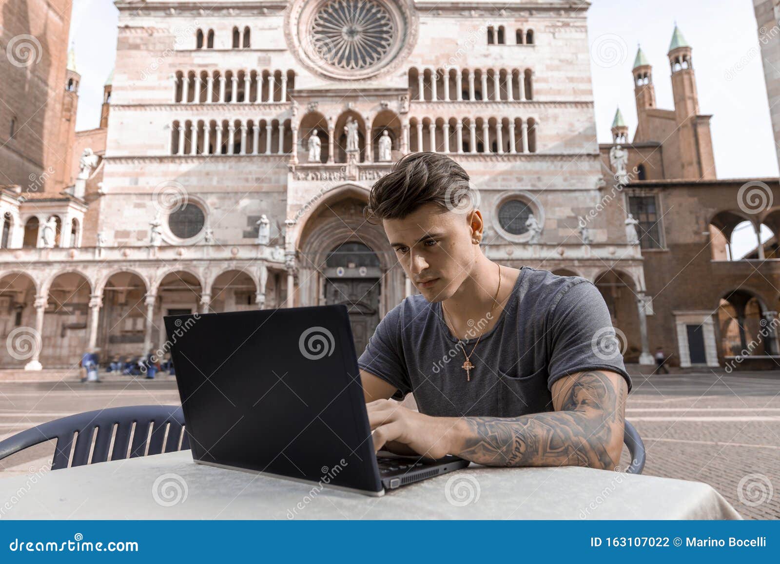 Young of the Millennials Generation Using the Laptop at the Bar of a ...