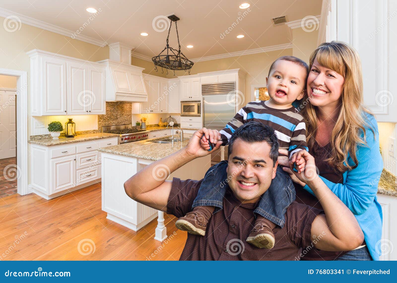 Young Mixed Race Family Having Fun in Custom Kitchen Stock Image ...