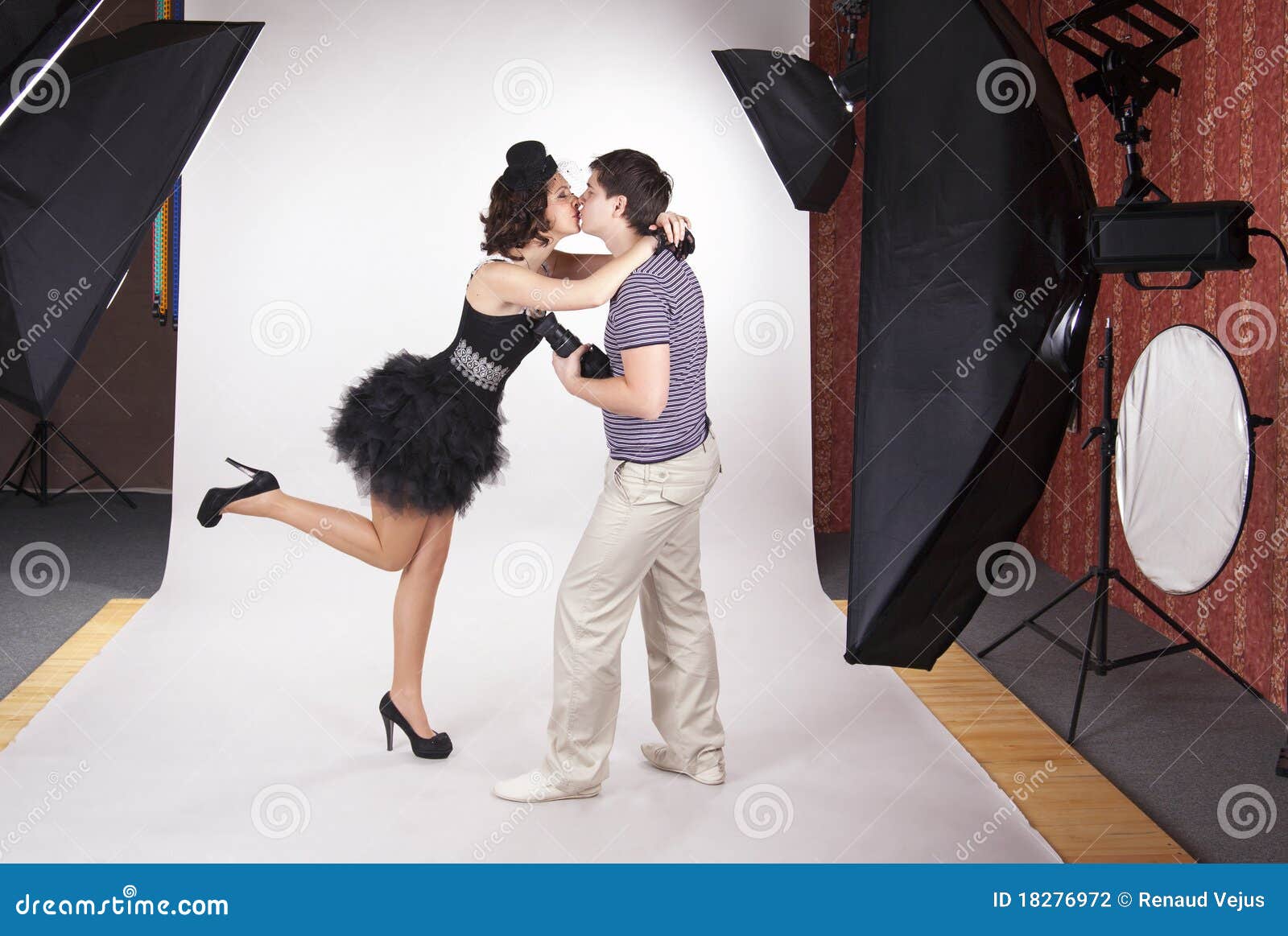 Young Model Kissing the Photographer Stock Photo - Image of equipment ...