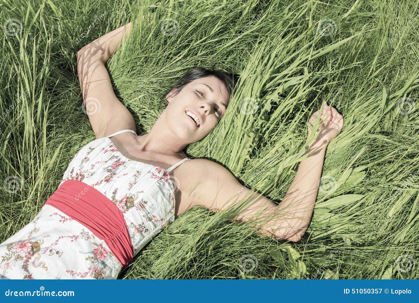 Young Model Laying in the Grass Stock Image - Image of girl, relax ...