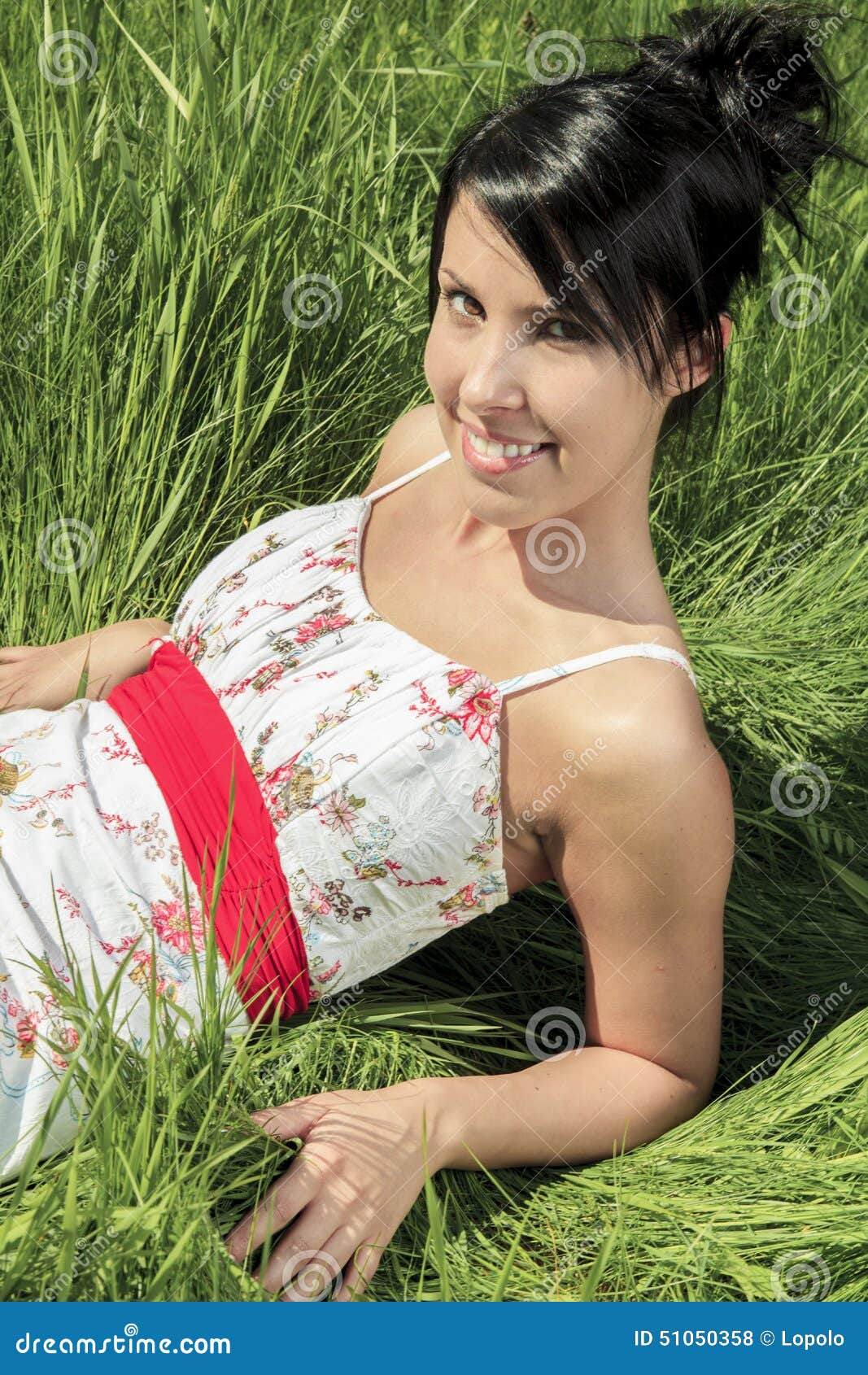 Young Model Laying in the Grass Stock Photo - Image of casual, cute ...
