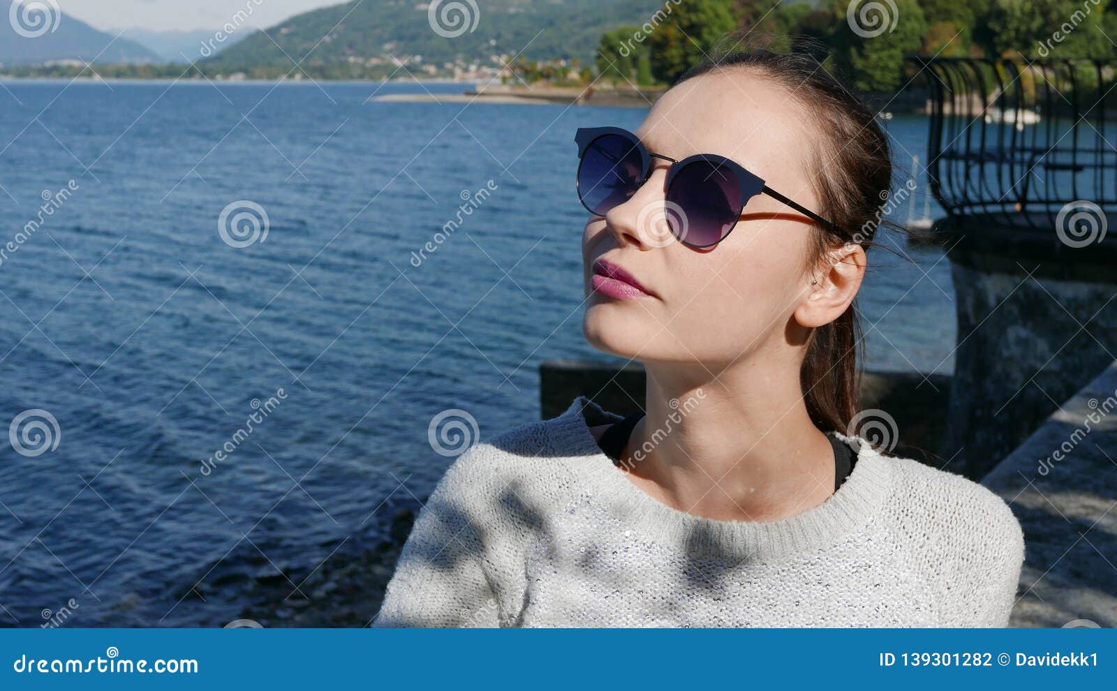 Young Model Poses by the Lake Stock Photo - Image of water, beautiful ...