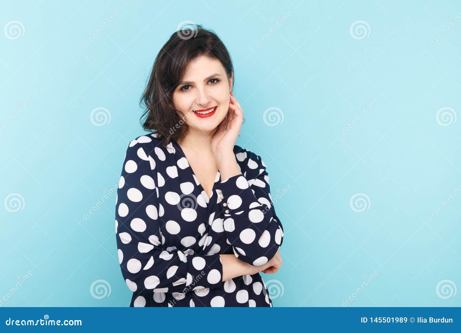 Young Model Posing on the Blue Background. Stock Image - Image of ...