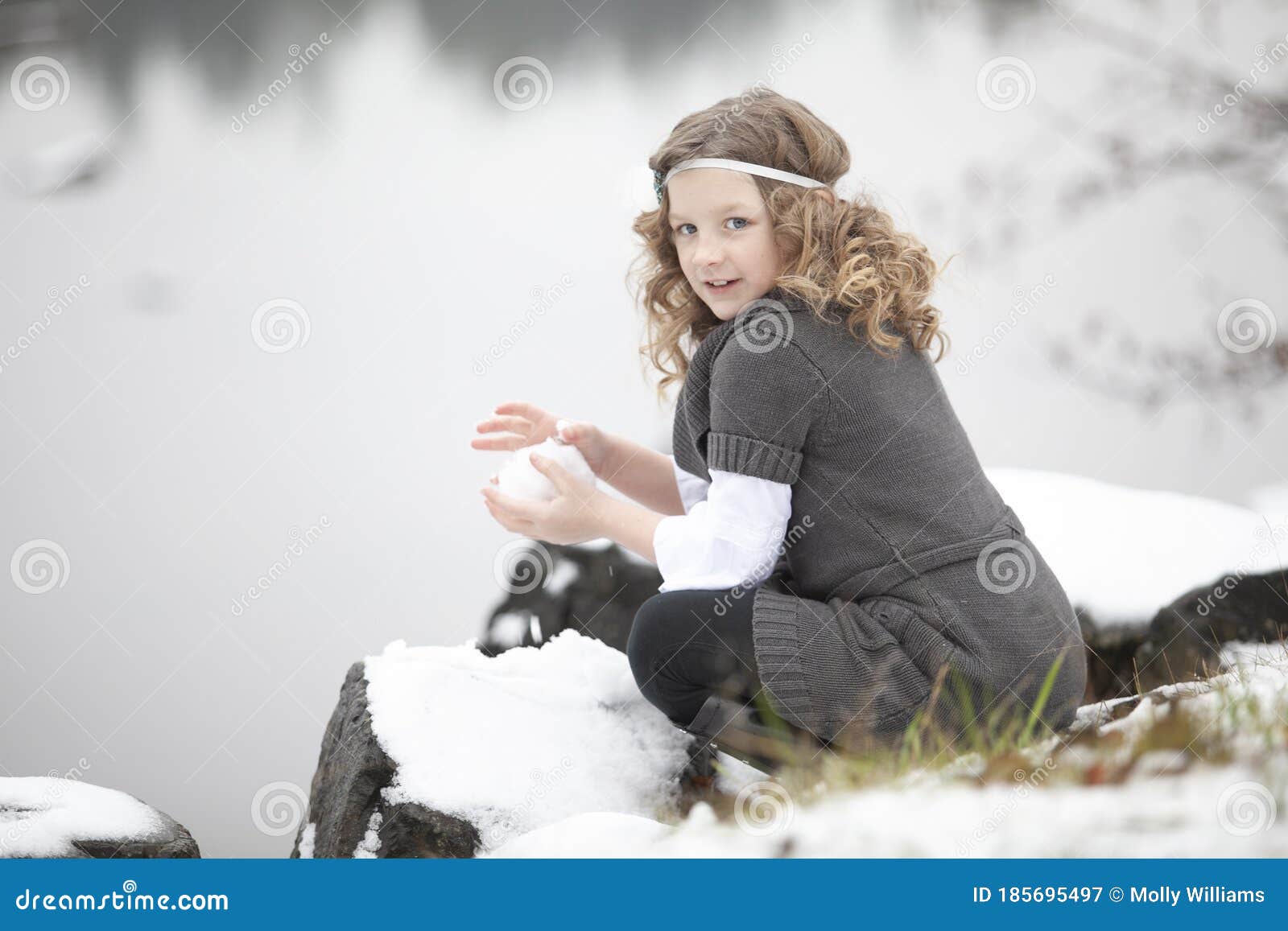 Young model posing in snow stock image. Image of camera - 185695497