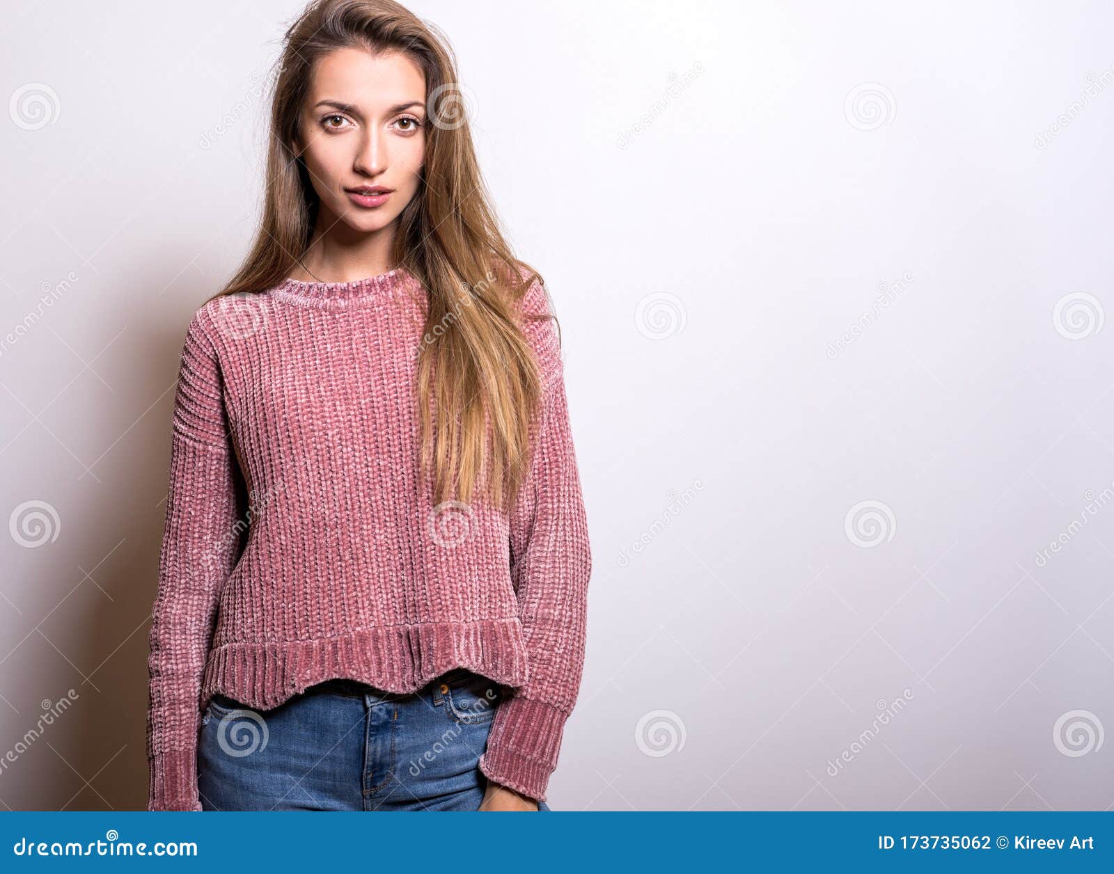 Young Model Woman in Sweater Pose in Studio. Stock Photo - Image of ...