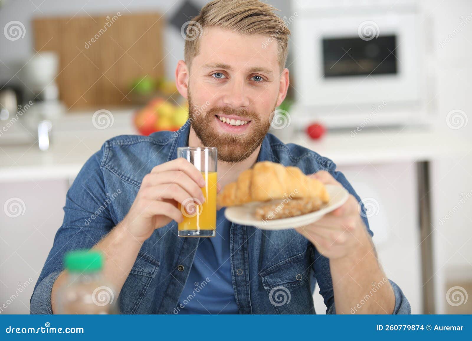 Young Modern Man Eating Sandwiches at Home Stock Photo - Image of ...