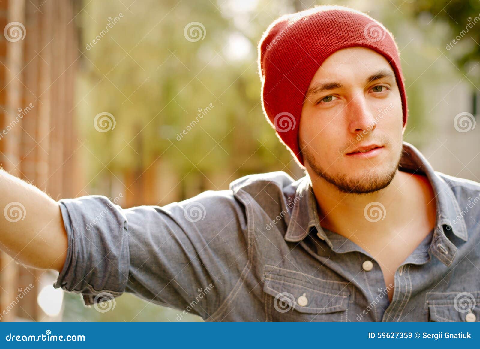 Young Modern Stylish Man with Red Cap Stock Image - Image of city ...