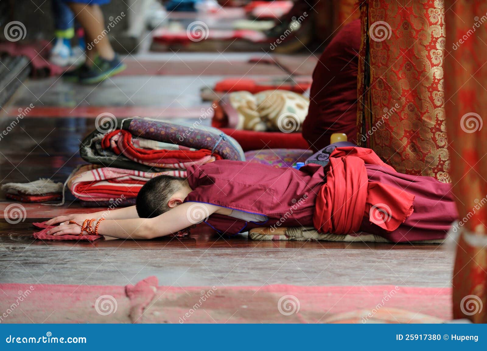 Young Monk Listen To Music Inside The Wat Suan Dok Temple, Chiang Mai ...