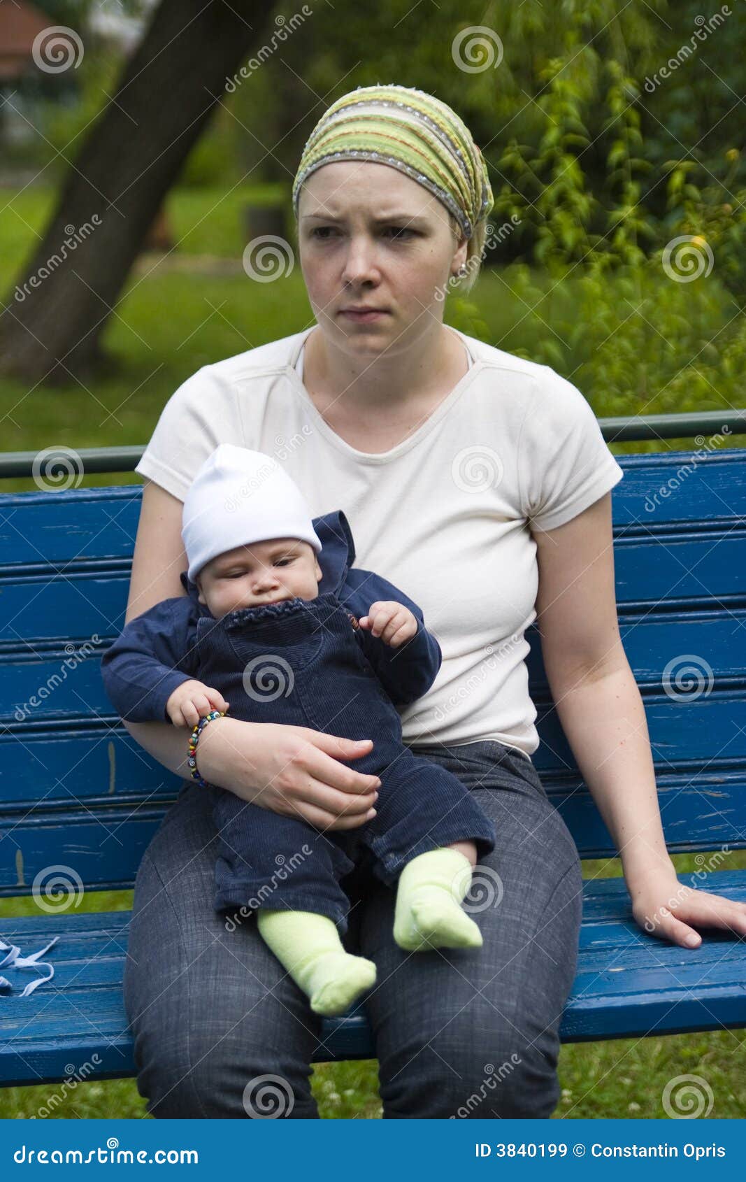 Young Mother and Baby on Bench Stock Image - Image of parent, frown ...