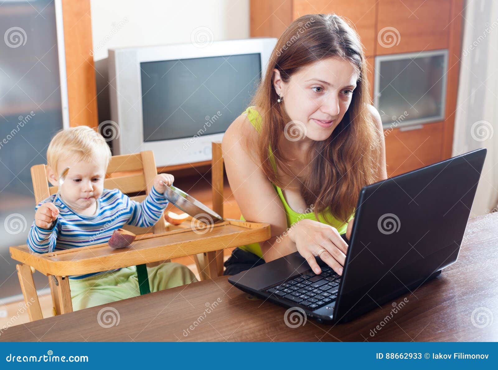 Young Mother with Baby Using Laptop Stock Image - Image of home ...