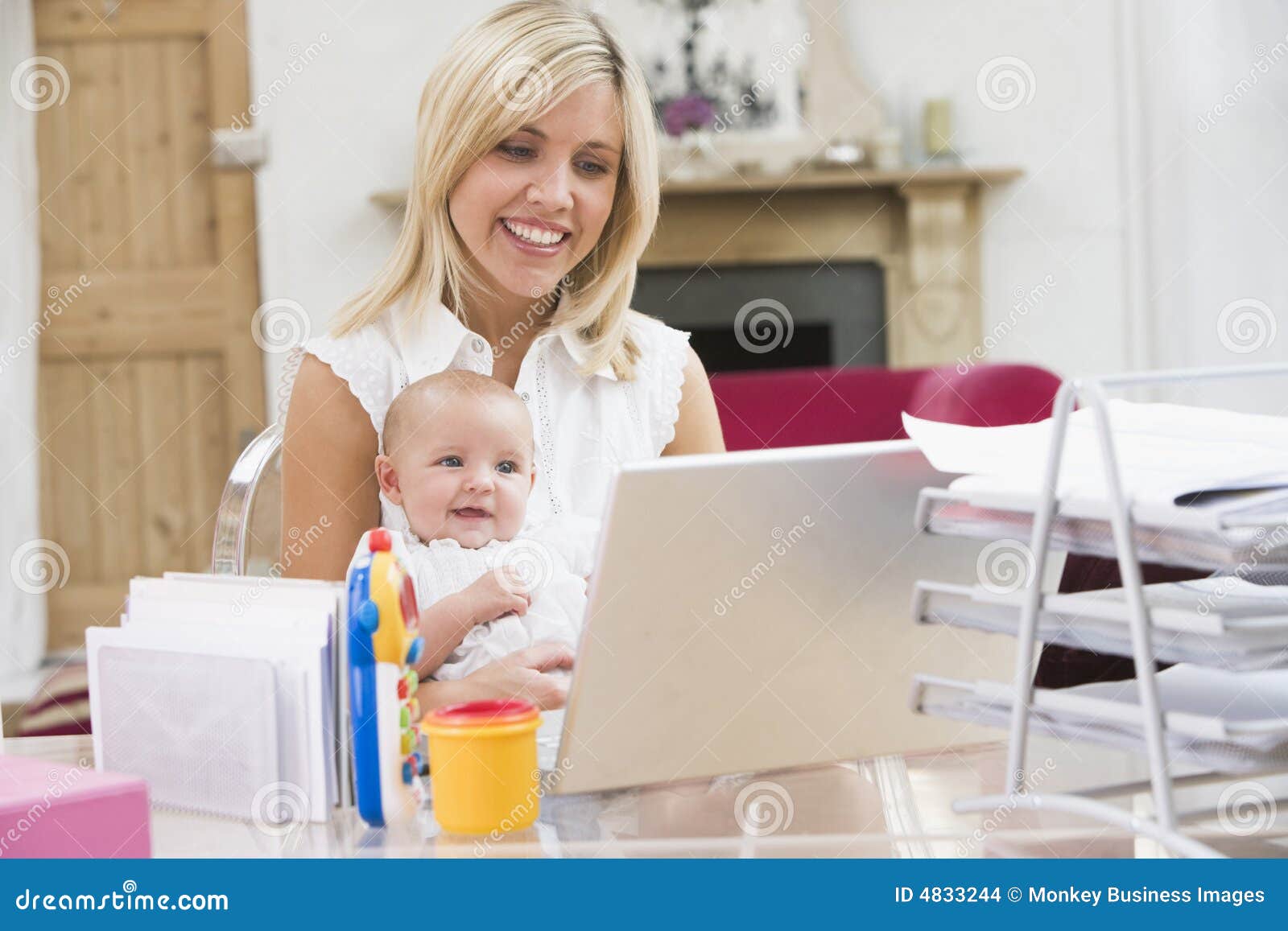 Young Mother with Baby Working from Home Stock Photo - Image of sitting ...