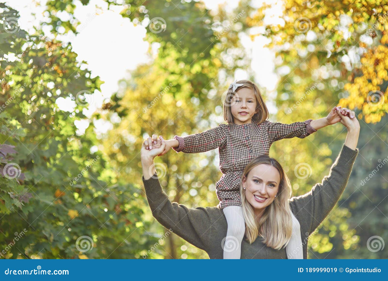 Mother Carrying Her Daughter Piggyback Stock Image - Image of daughter ... Mother Carrying Her Daughter Piggyback Stock Image - Image of daughter ...