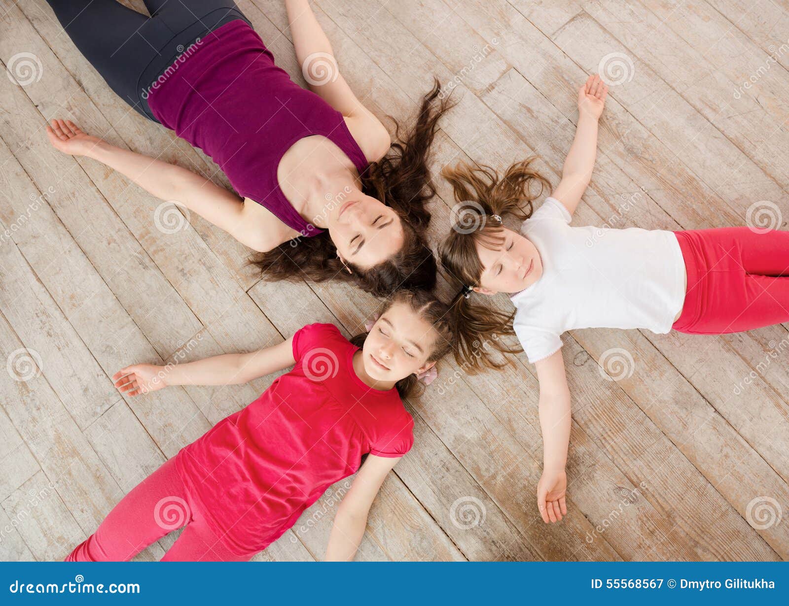 Young Mother and Daughter Lying on the Floor Stock Image - Image of ...