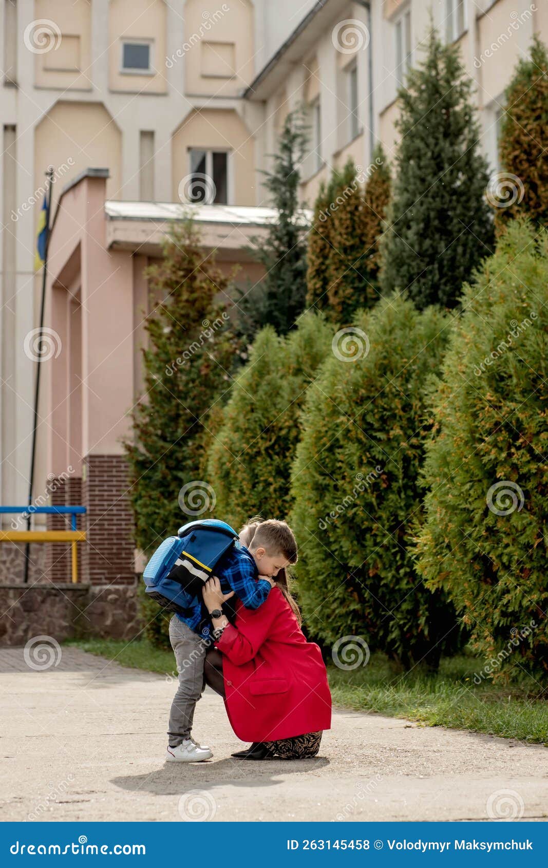 Young Mother Embraces Her Excited First Class Son on the Way To School ...