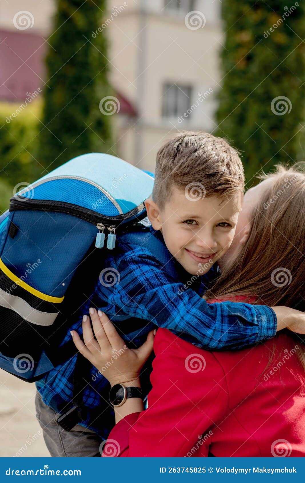 Young Mother Embraces Her Excited First Class Son on the Way To School ...
