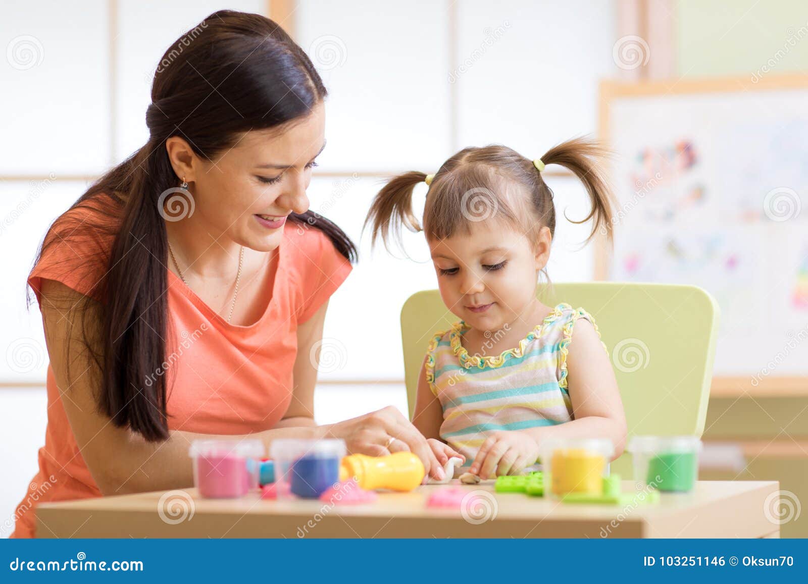 Young Mother and Her Child Daughter Moulding Together from Plasticine ... Young Mother and Her Child Daughter Moulding Together from Plasticine ...