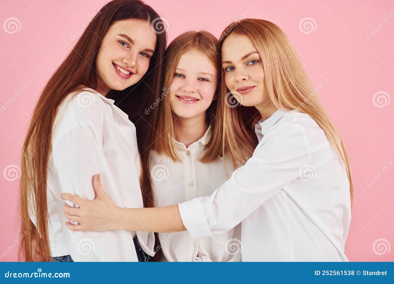 Young Mother with Her Two Daughters is in the Studio Stock Photo - Image of long, love: 252561538