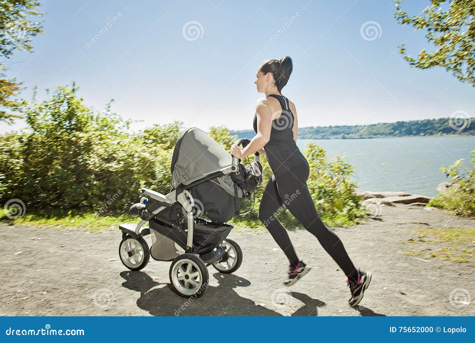 Young Mother Jogging with a Baby Buggy Stock Photo - Image of physical ...