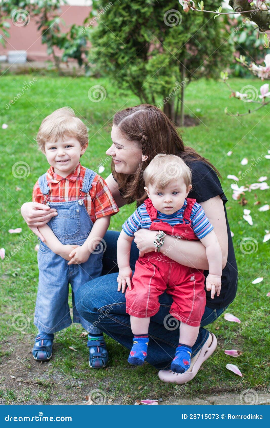 Young Mother and Two Little Boys Stock Image - Image of summer, family ...