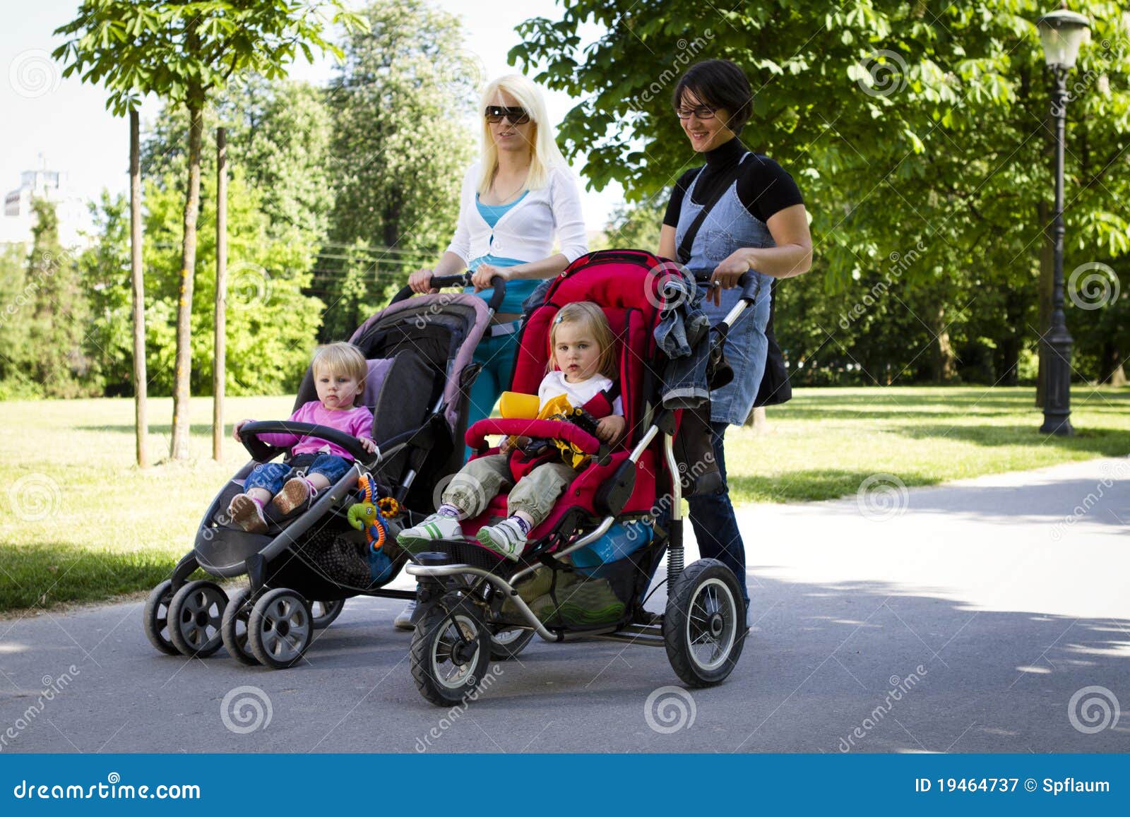 Young mothers in the park stock image. Image of tree - 19464737