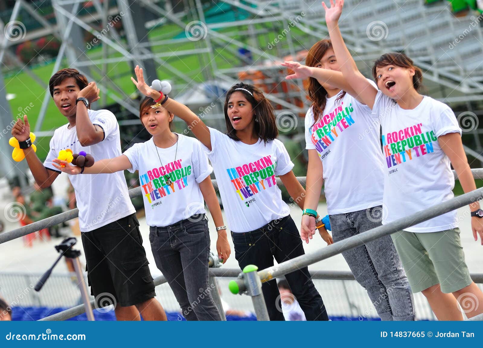 Young Motivators Waving To Crowd during NDP Editorial Image - Image of ...