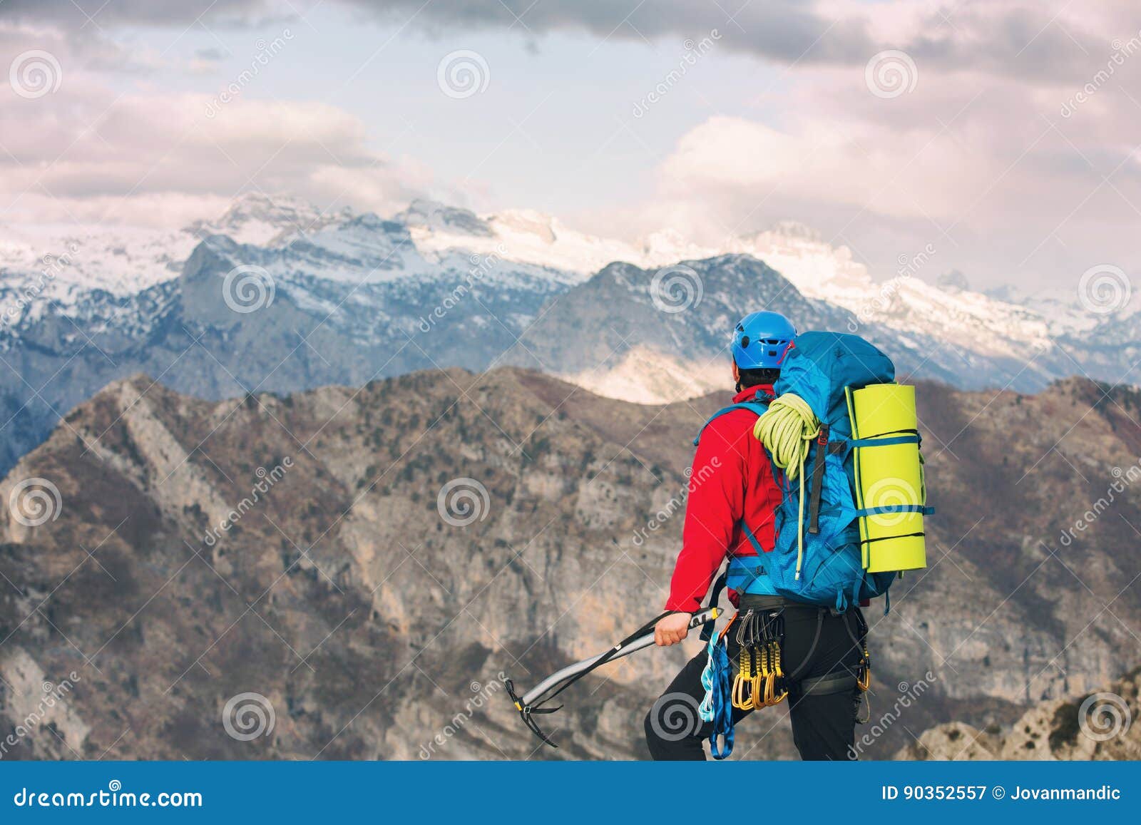 Young Mountaineer Standing with Backpack on Top of a Mountain Stock ...