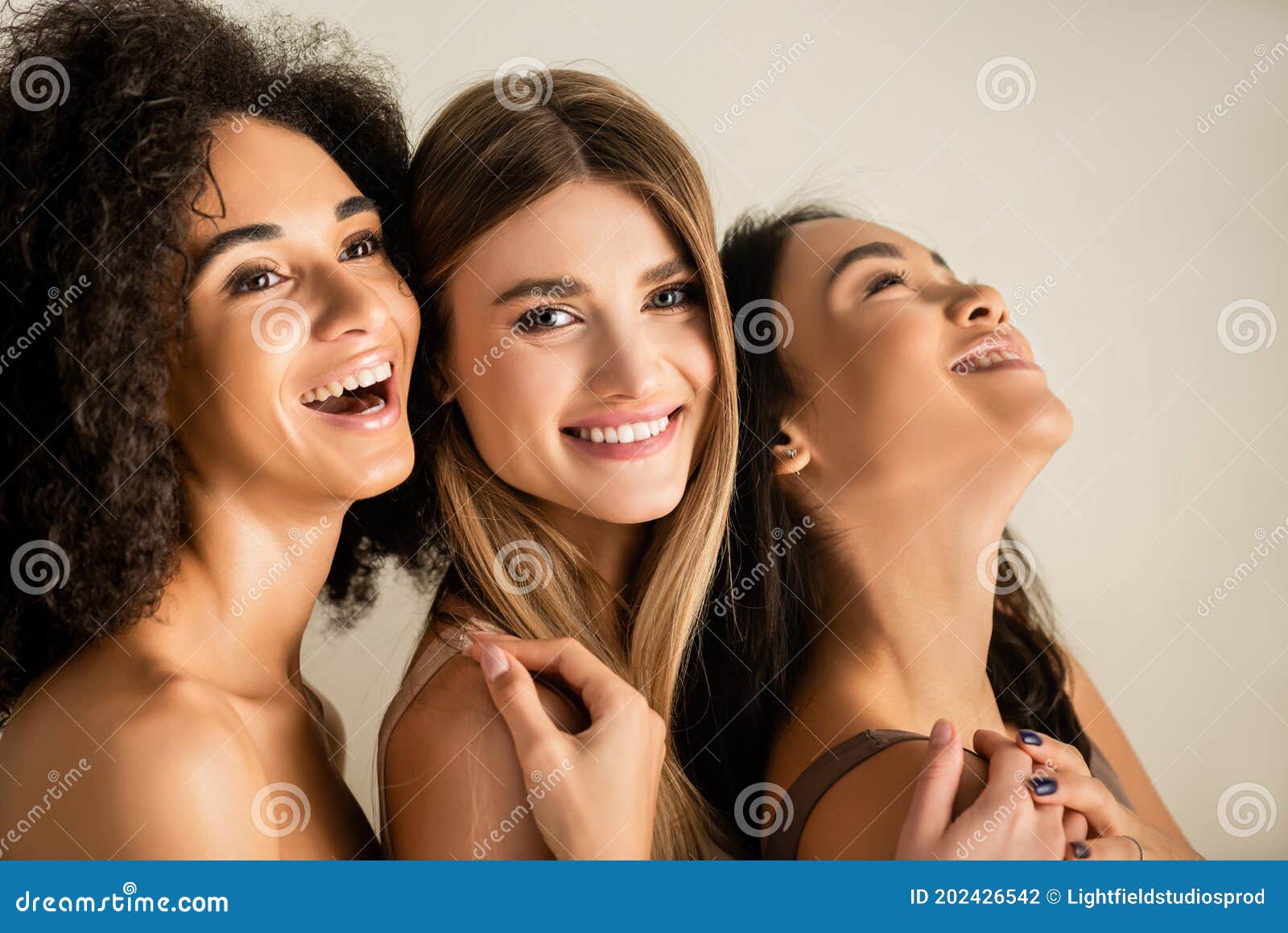 Multicultural Models Looking at Camera and Stock Photo - Image of ...