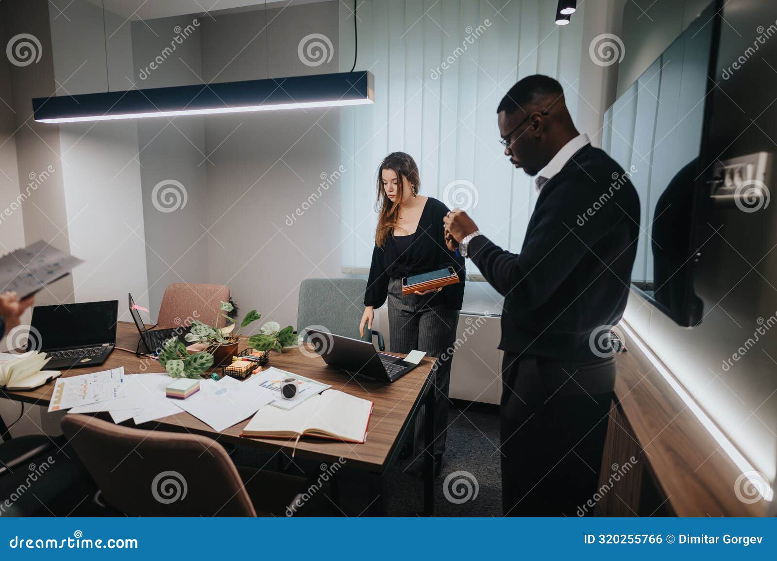 Young Multicultural Office Team Collaborating in a Modern Workspace ...