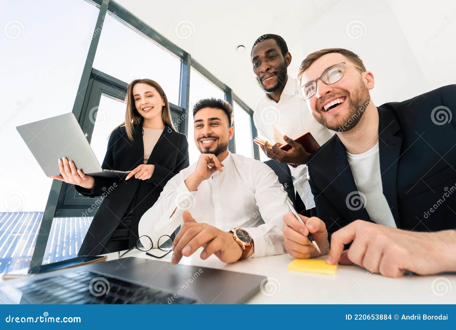 Young Multiracial Ambitious Team Of Programmers Are Thinking About A ... Young Multiracial Ambitious Team Of Programmers Are Thinking About A ...