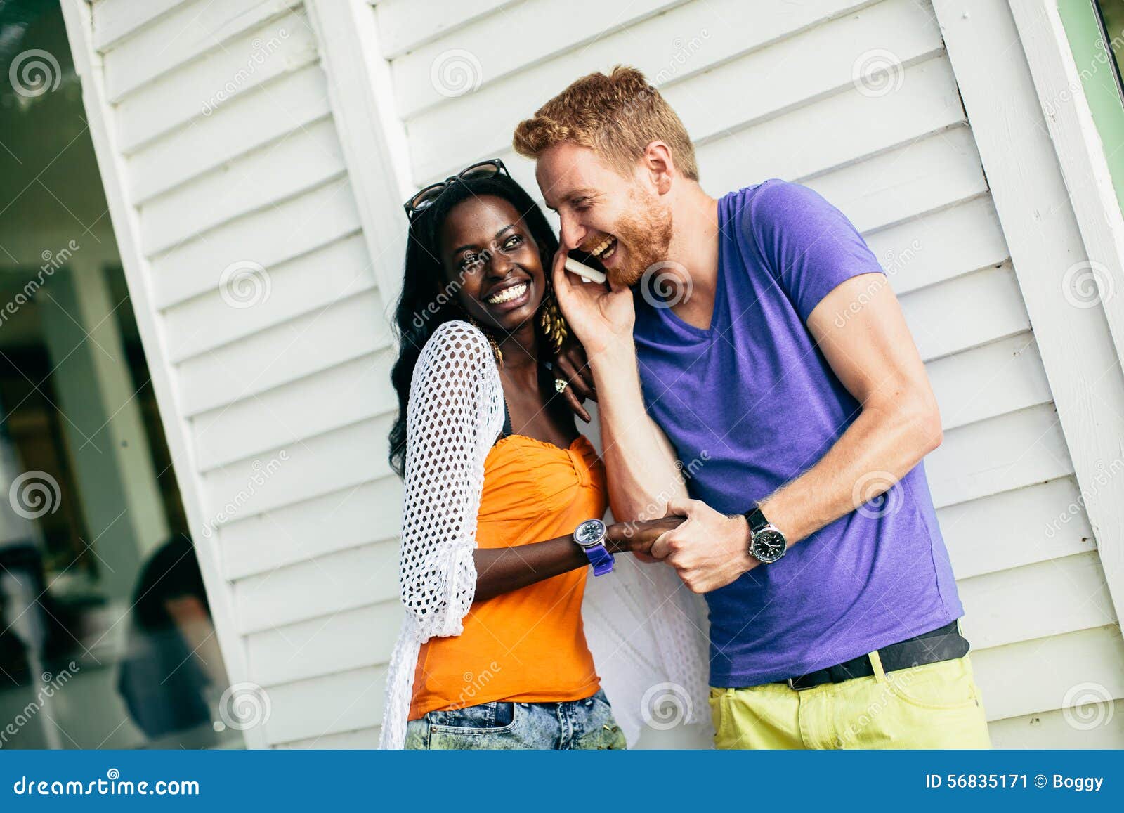 Young Multiracial Couple with Mobile Phone Stock Image - Image of young ...