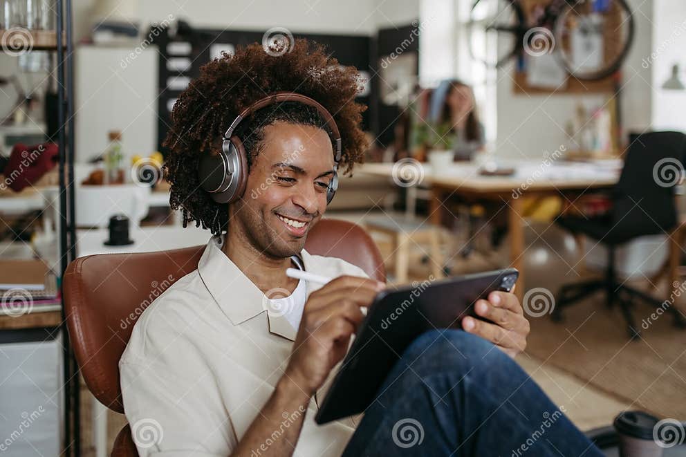 Young Multiracial Man Drawing Something in Designers Studio. Stock ...