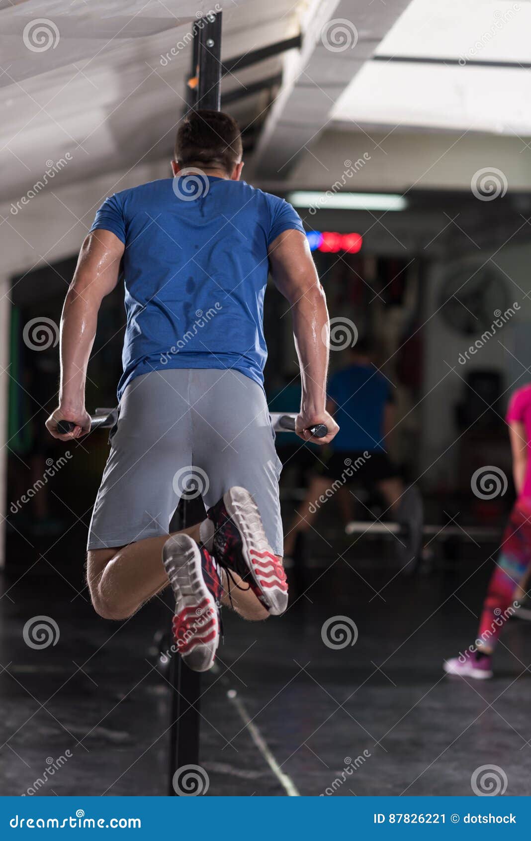 Man Doing Exercises Parallel Bars Stock Image - Image of athletic ...