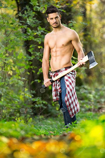 Young muscular lumberjack stock photo. Image of lumberjack - 37047410