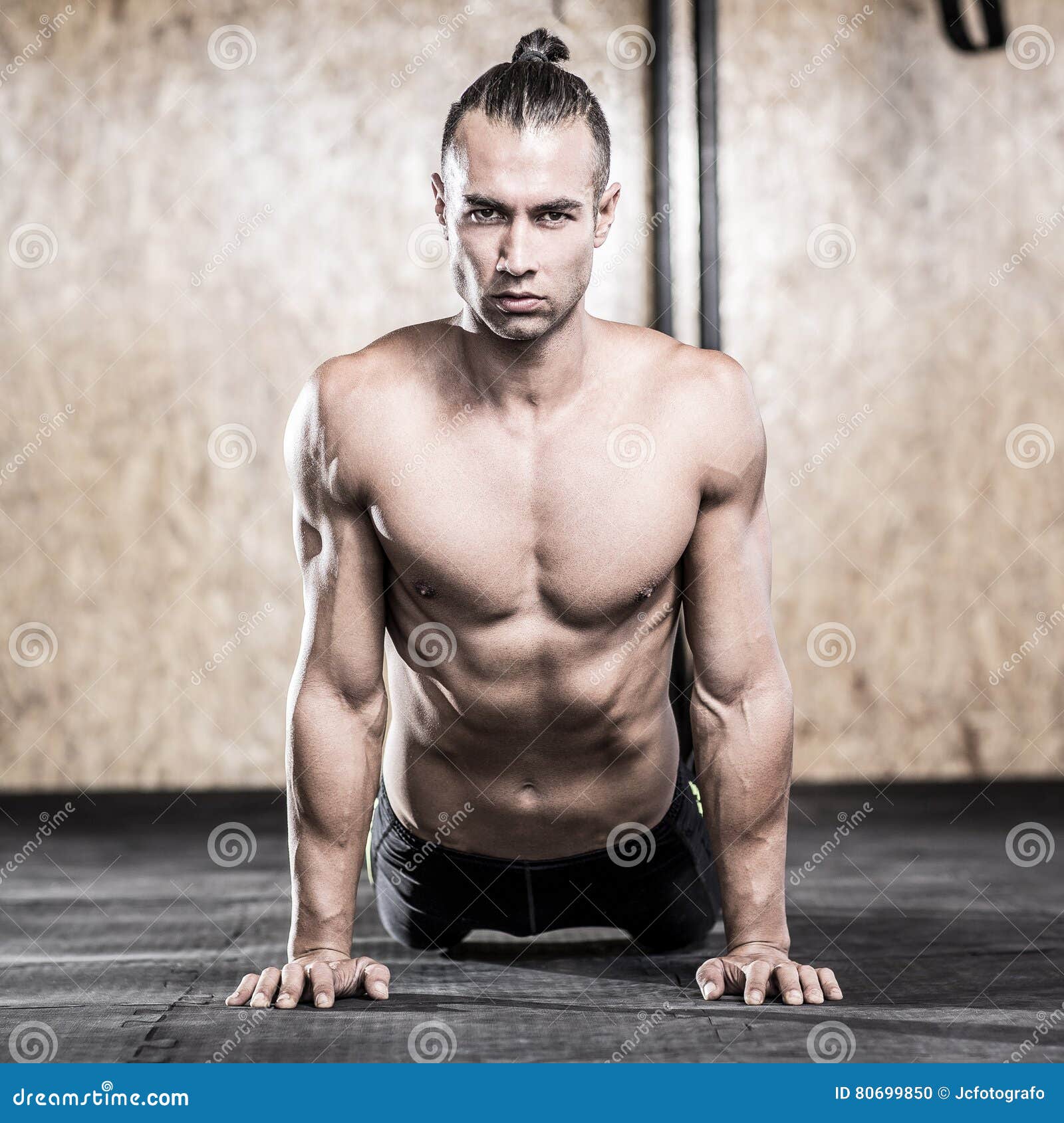 Young muscular man in gym stock photo. Image of muscular - 80699850