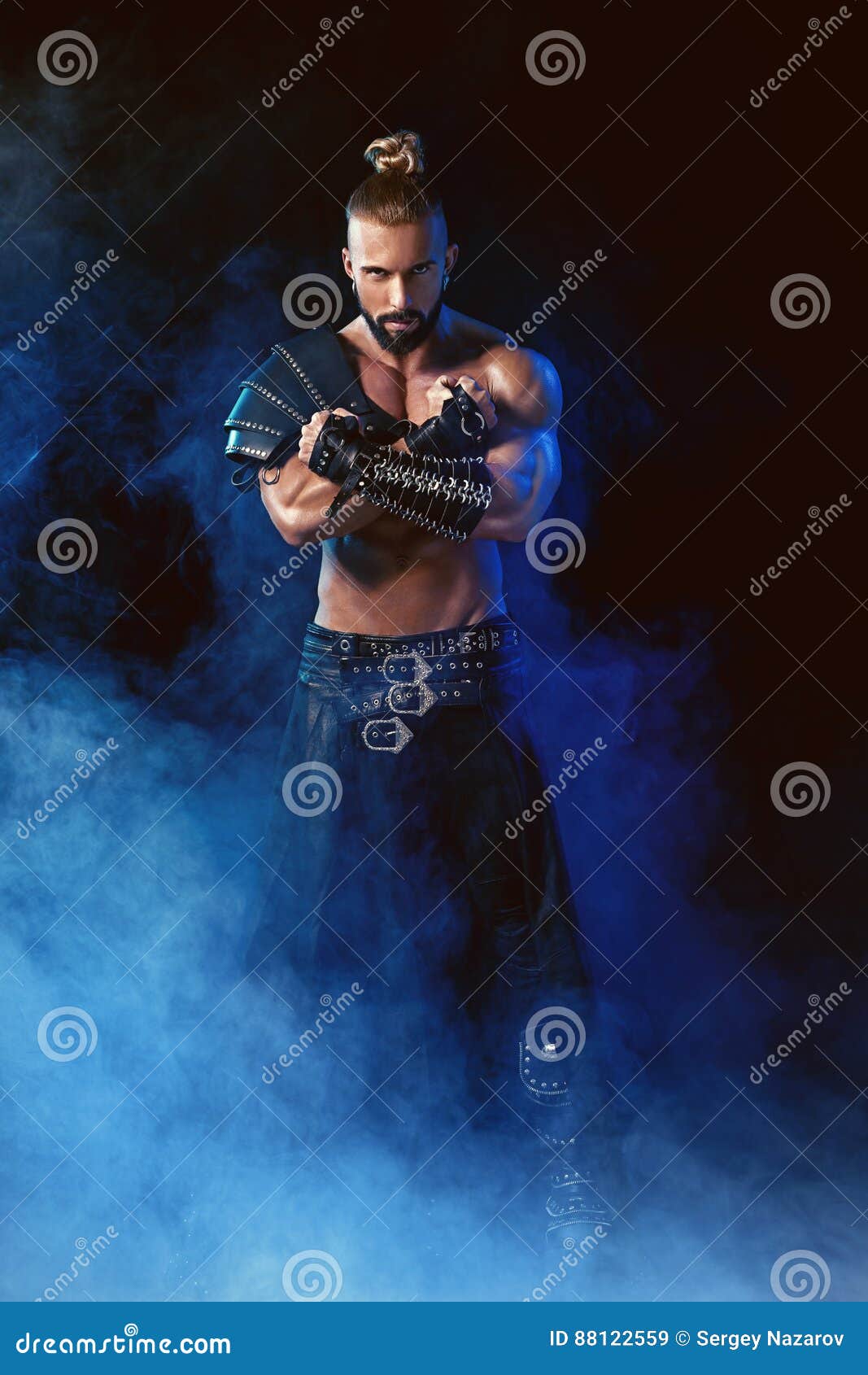 Young and Muscular Man Performing a Theatrical Pose on Stage. Stock ...