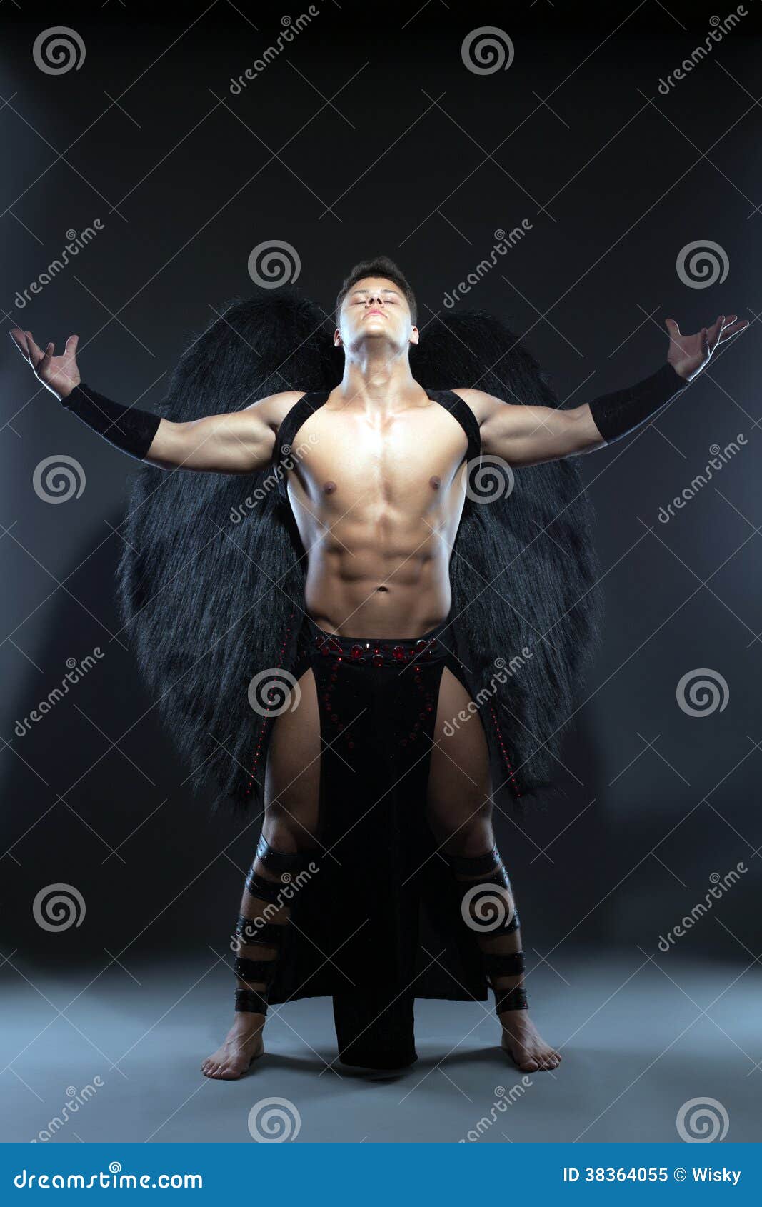 Young Muscular Man Posing As Fallen Angel Stock Image - Image of male ...