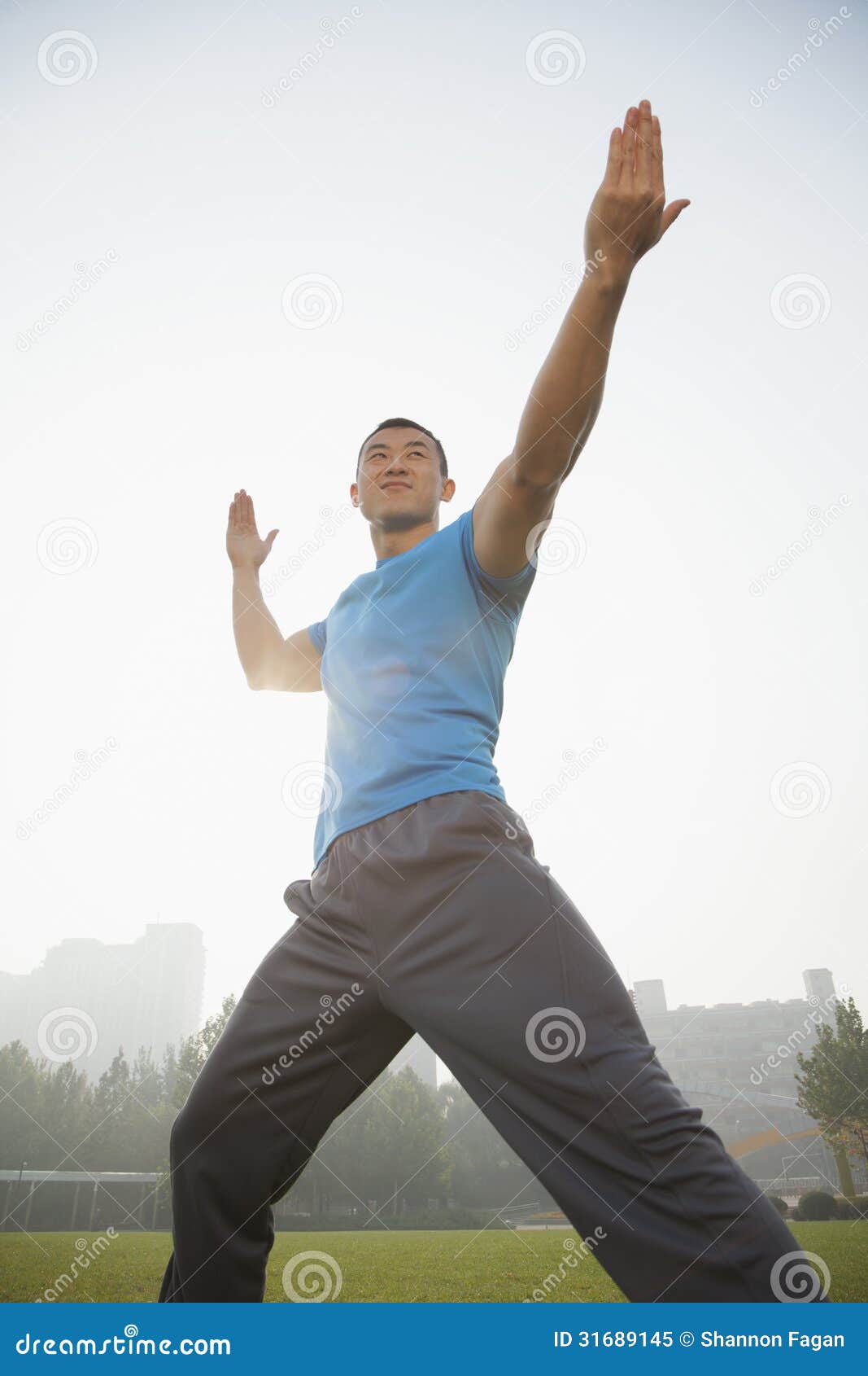Young Muscular Man Stretching Stock Image - Image of muscular ...