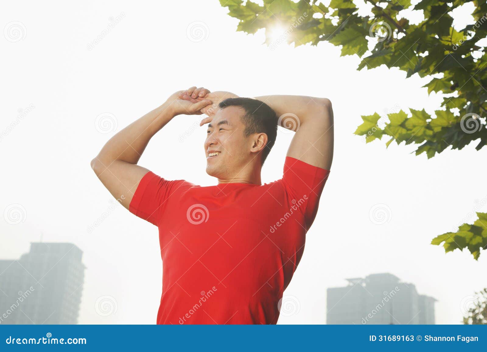 Young Muscular Man Stretching Stock Image - Image of exercising, hair ...