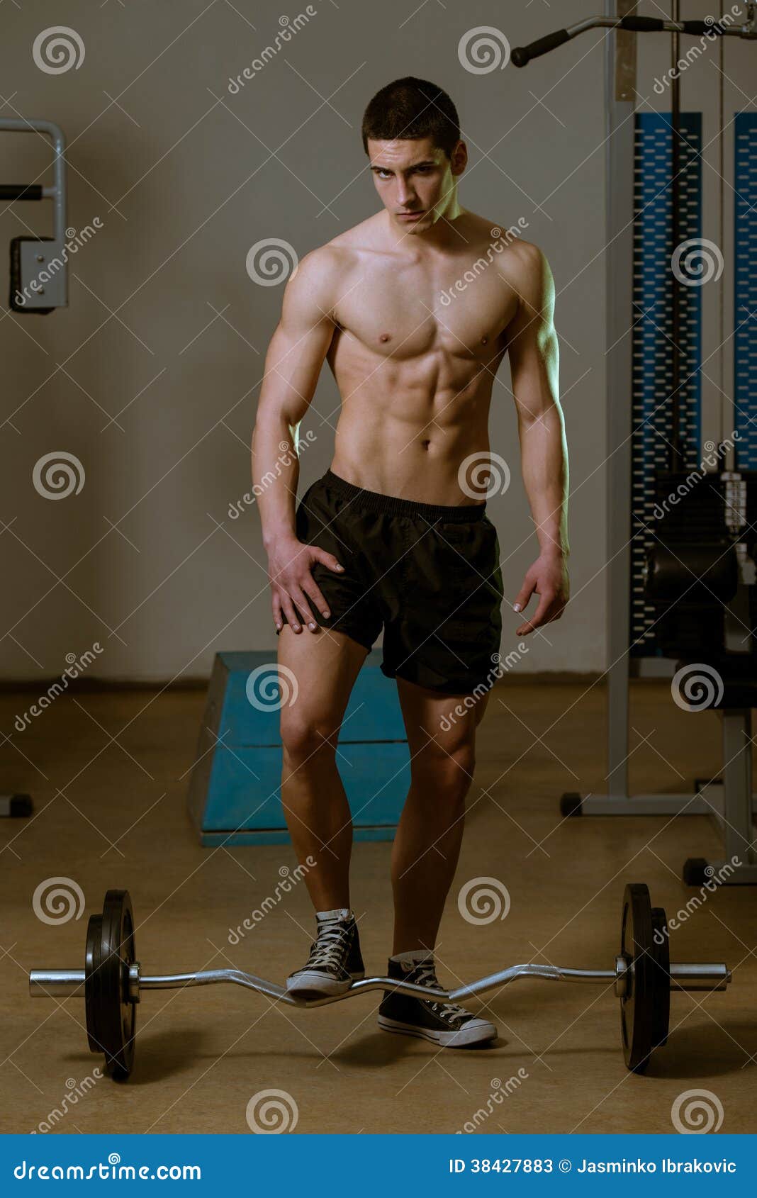 Young Muscular Men Standing by the Barbell Stock Image - Image of body ...