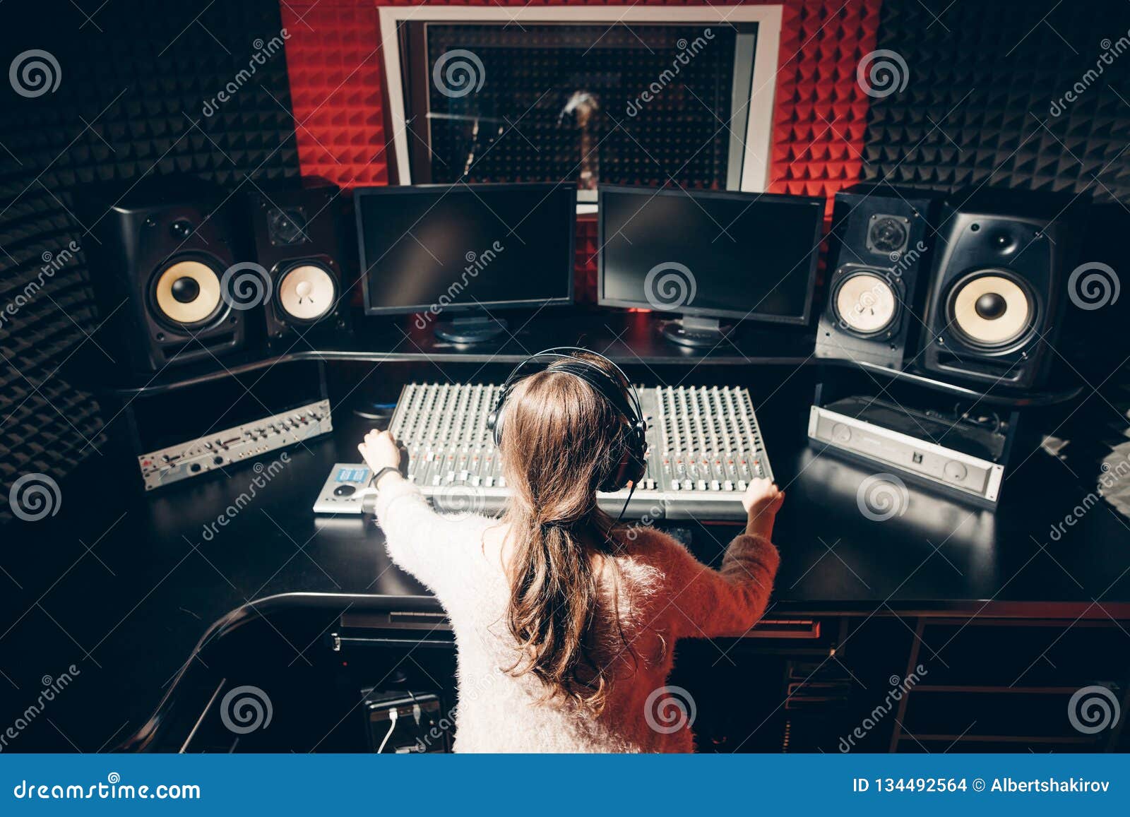 Young Music Operator Controlling the Sound in the Studio Stock Photo ...