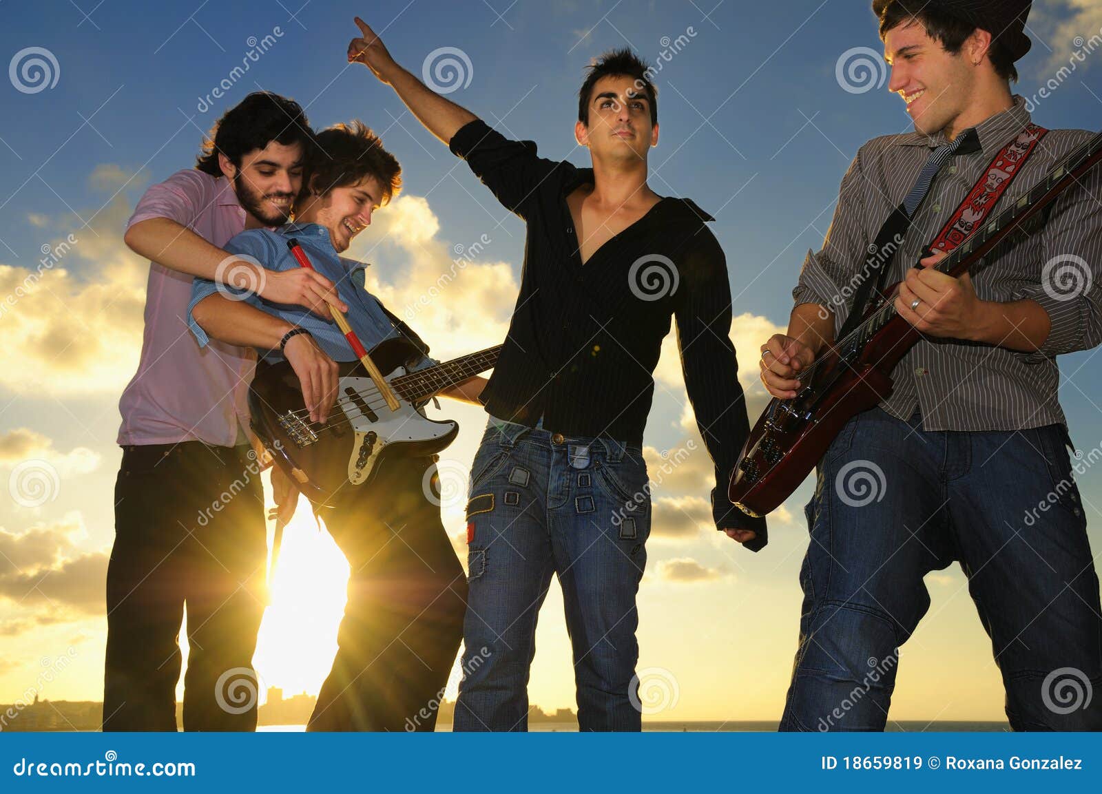 Young Musical Band with Instruments at Sunset Stock Image - Image of ...