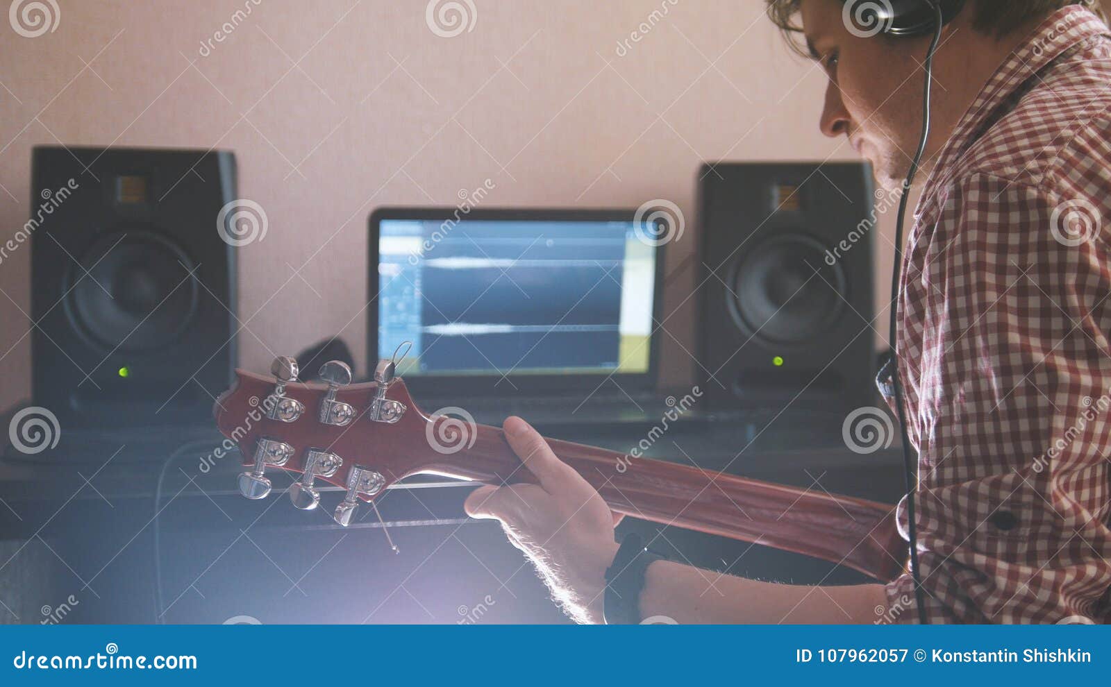 Young Musician Composes and Records Music Playing the Electric Guitar ...