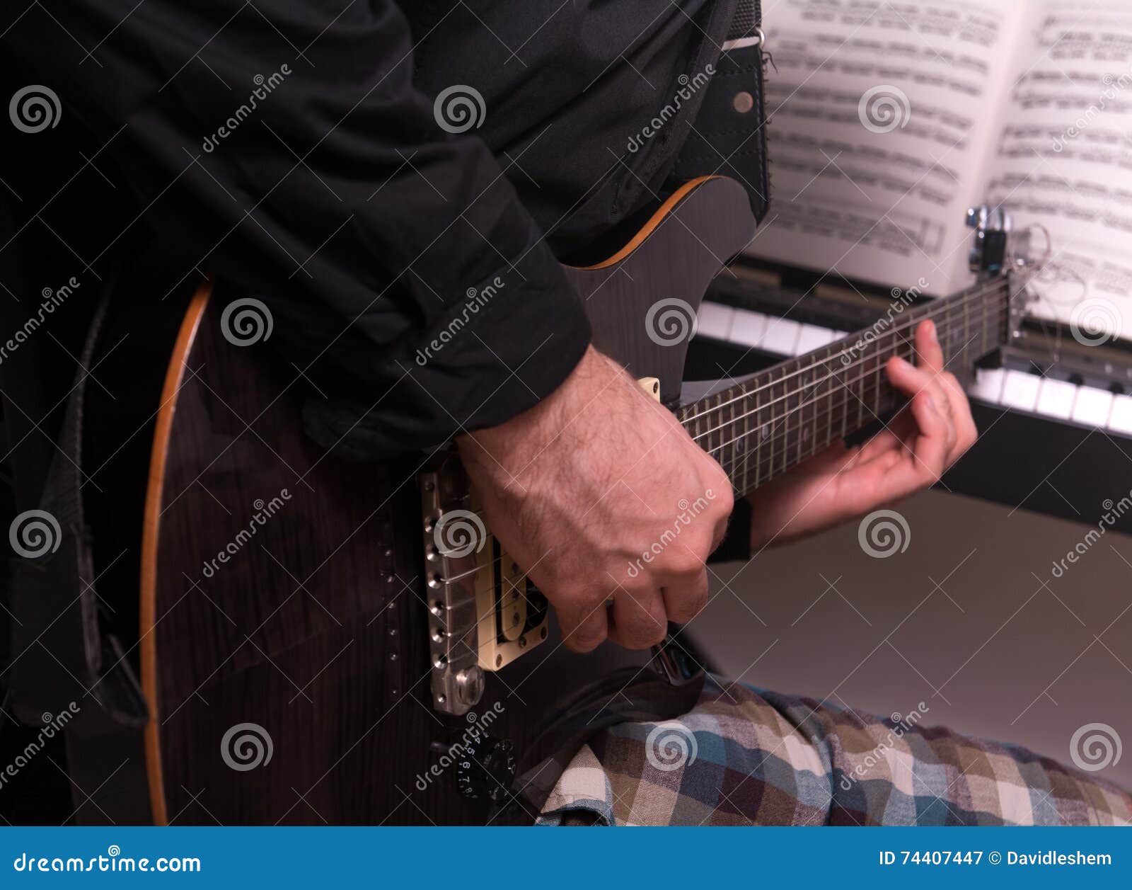 Young musician practicing stock image. Image of detail - 74407447