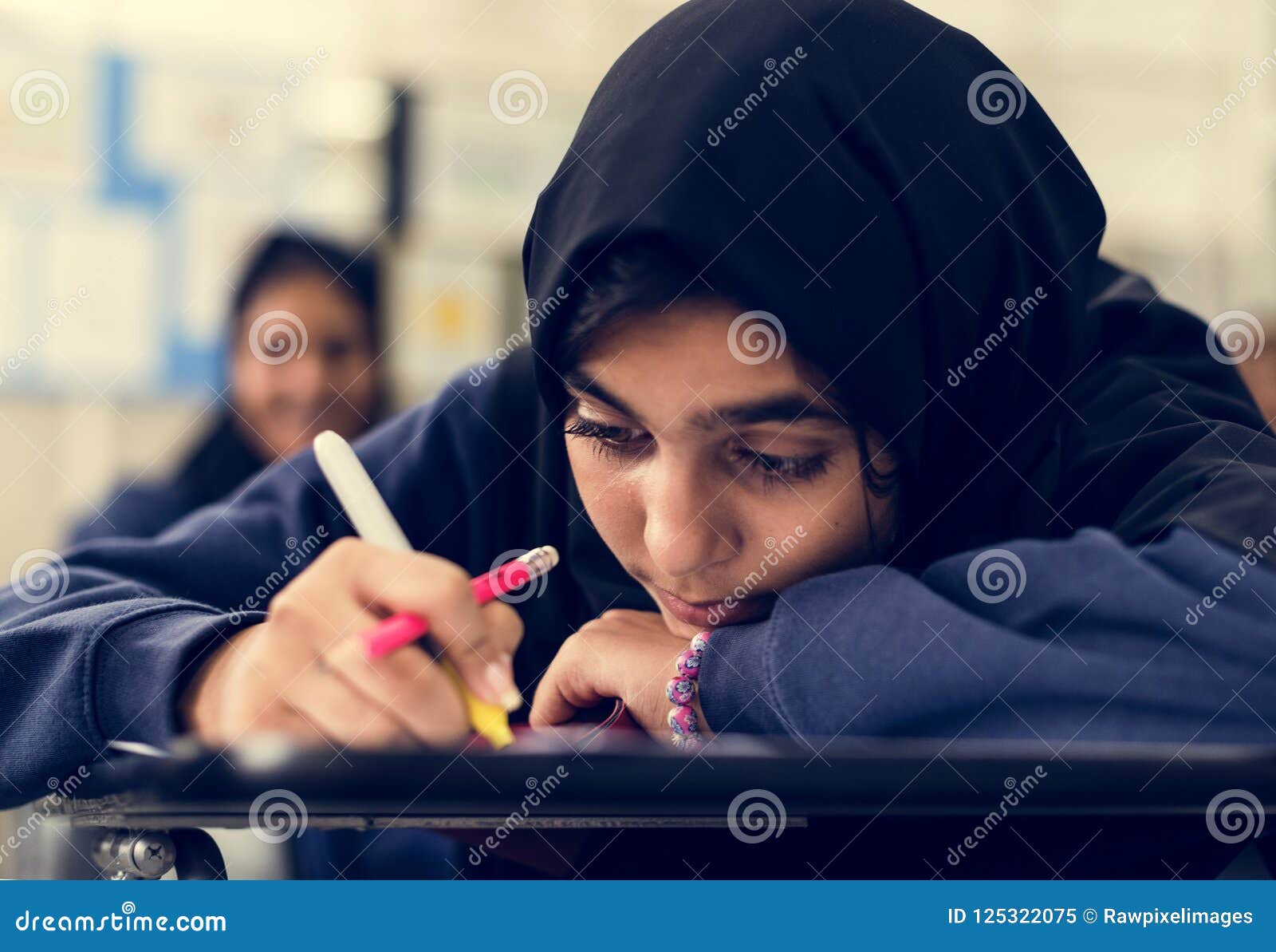 Young Muslim Student Studying at School Stock Image - Image of qutar ...