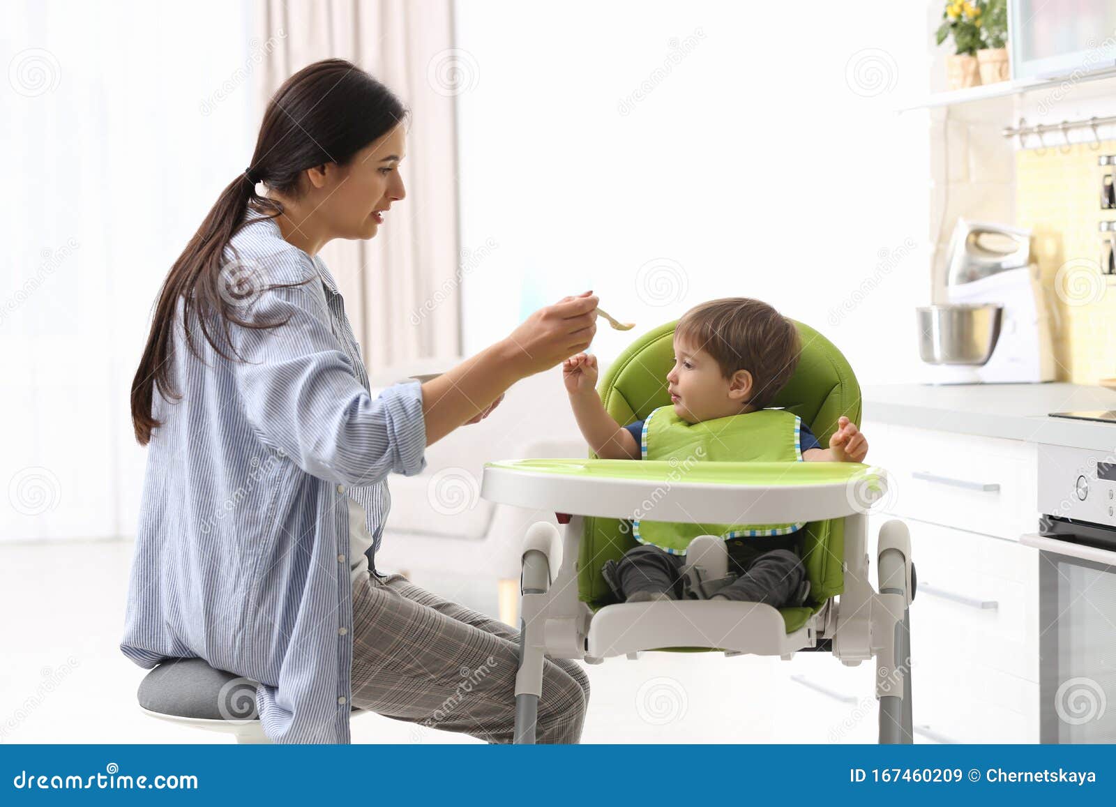 Young Nanny Feeding Cute Little Baby Stock Image - Image of care ...