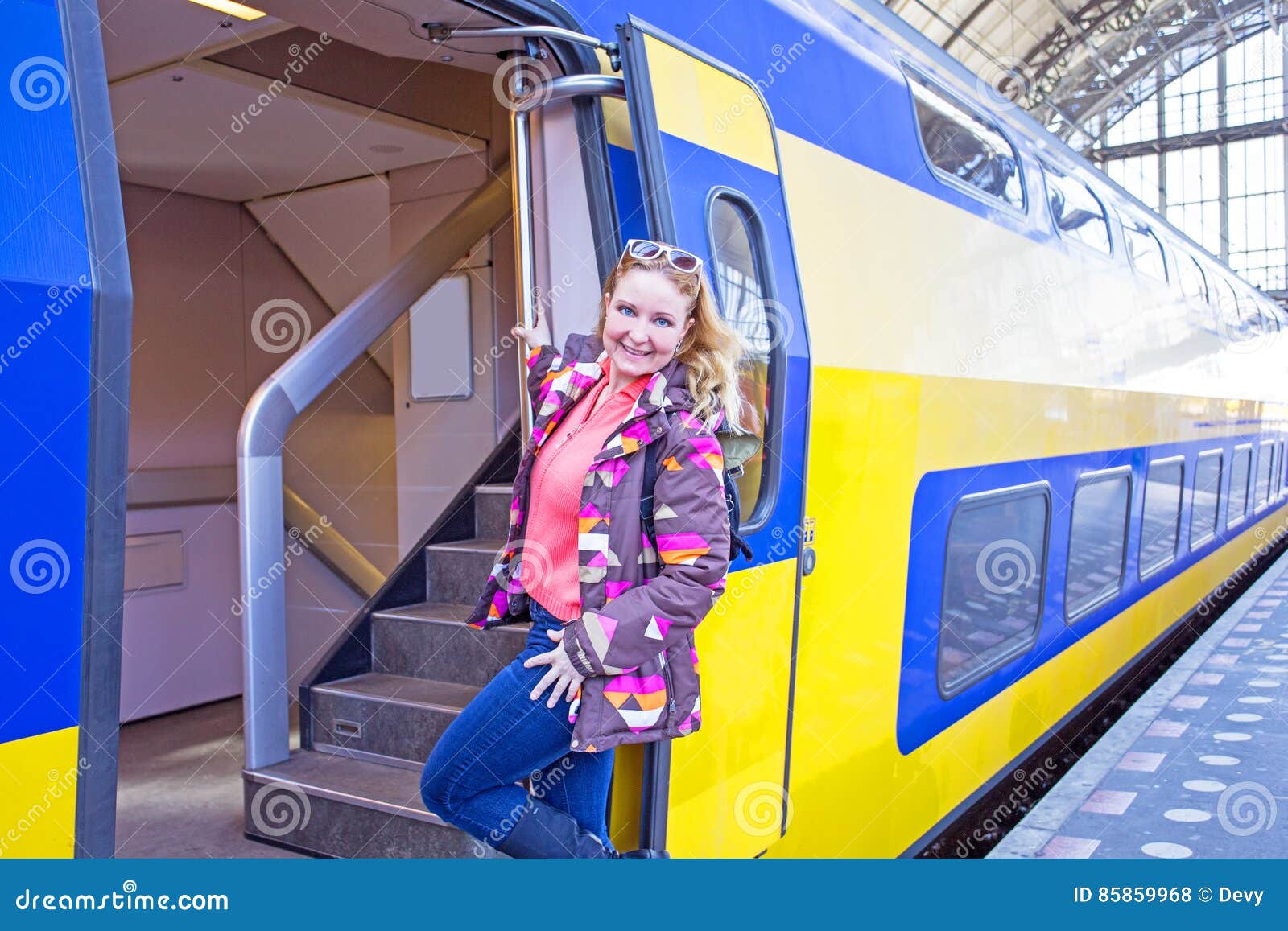 Young Native Dutch Woman Getting on a Train in Amsterdam Stock Photo ...