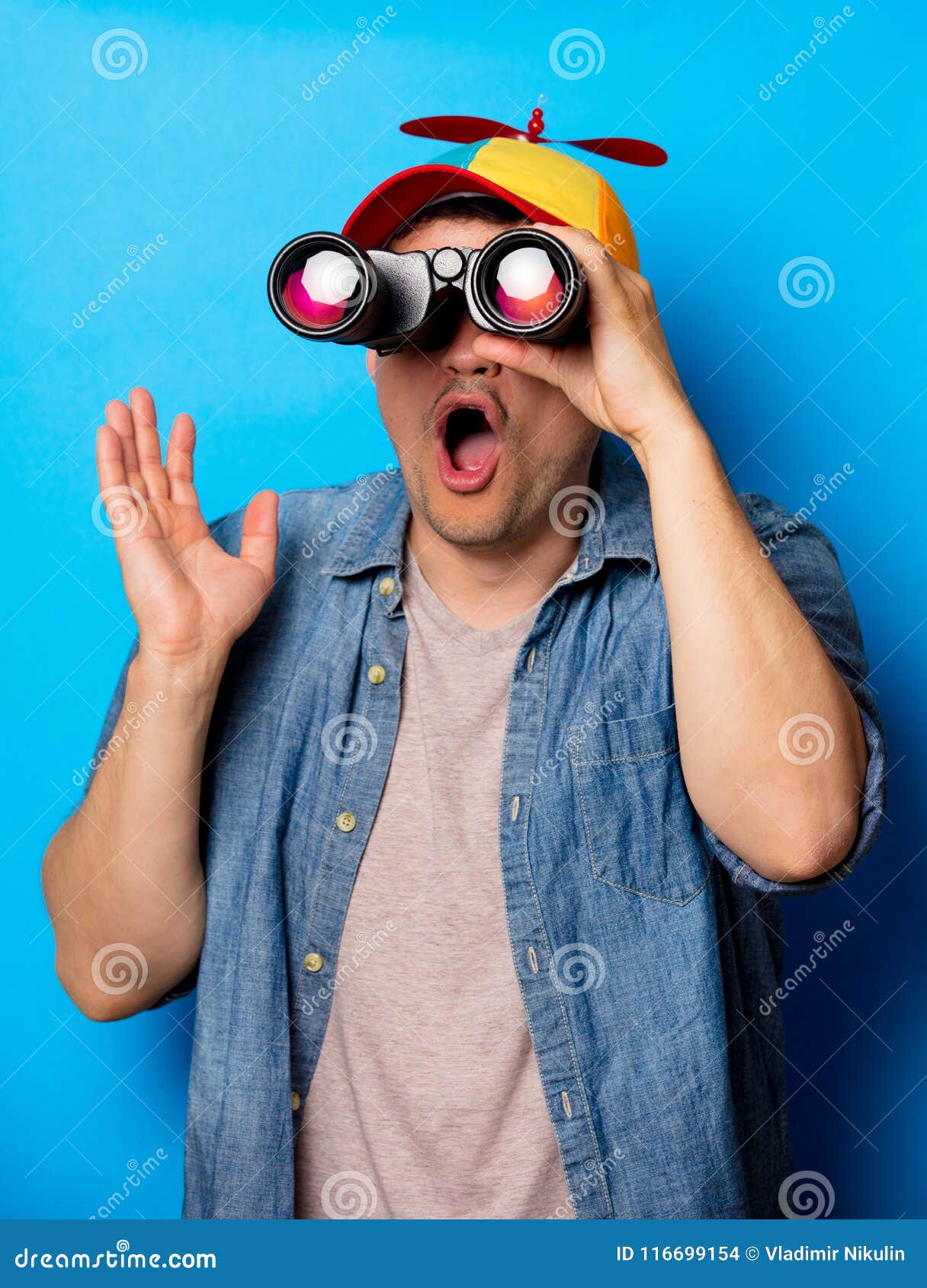 Young Nerd Man with Noob Hat Using a Binoculars Stock Photo - Image of ...