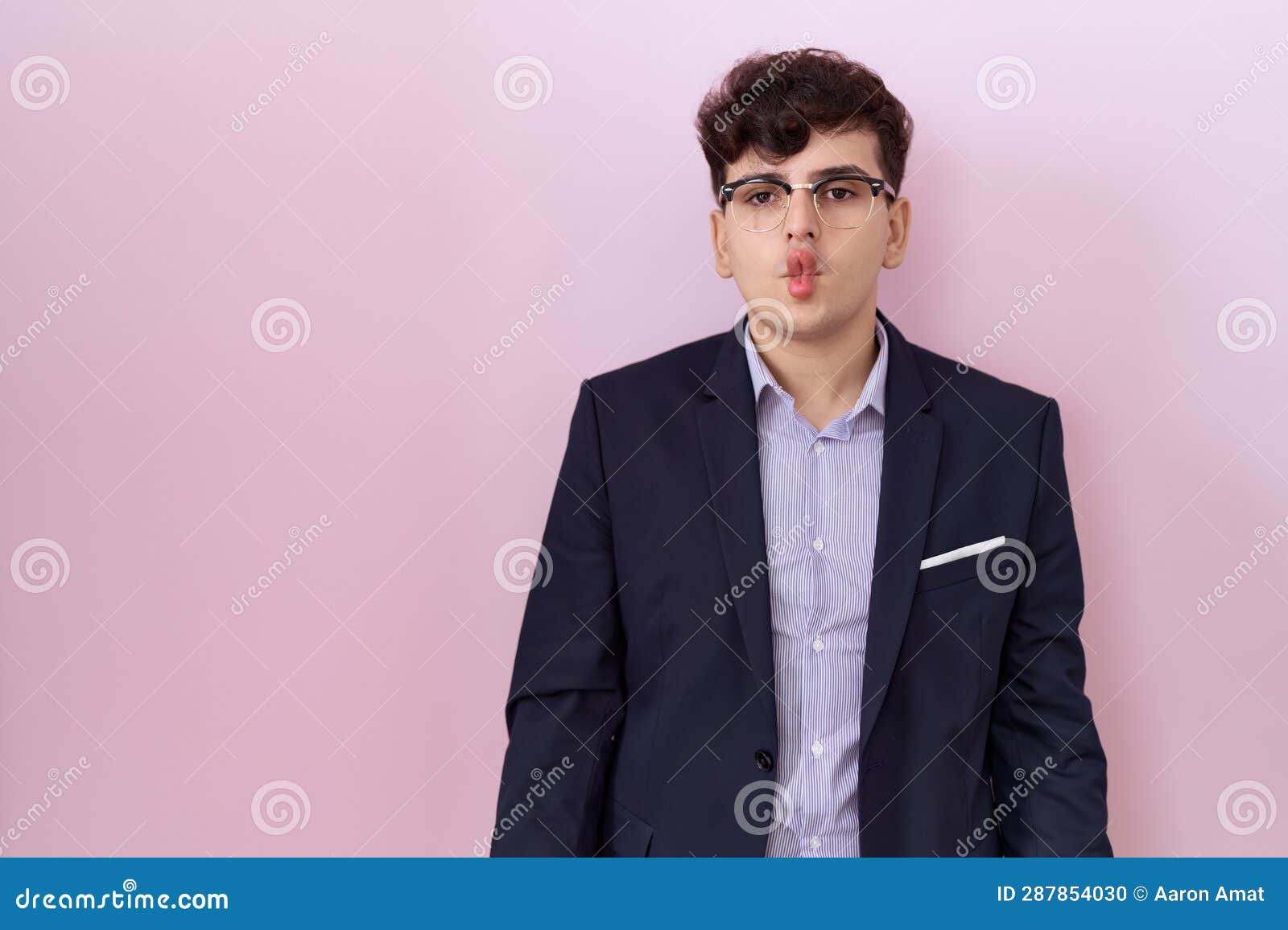 Young Non Binary Man with Beard Wearing Suit and Tie Making Fish Face ...