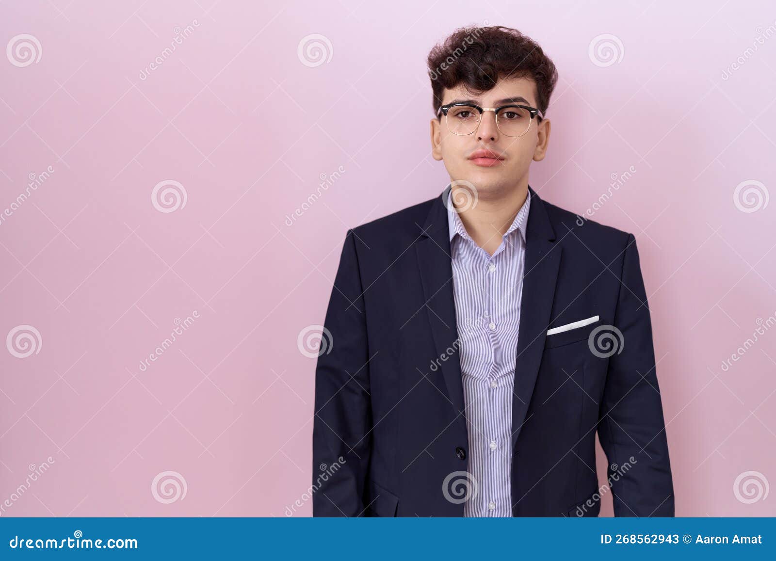 Young Non Binary Man with Beard Wearing Suit and Tie Relaxed with ...