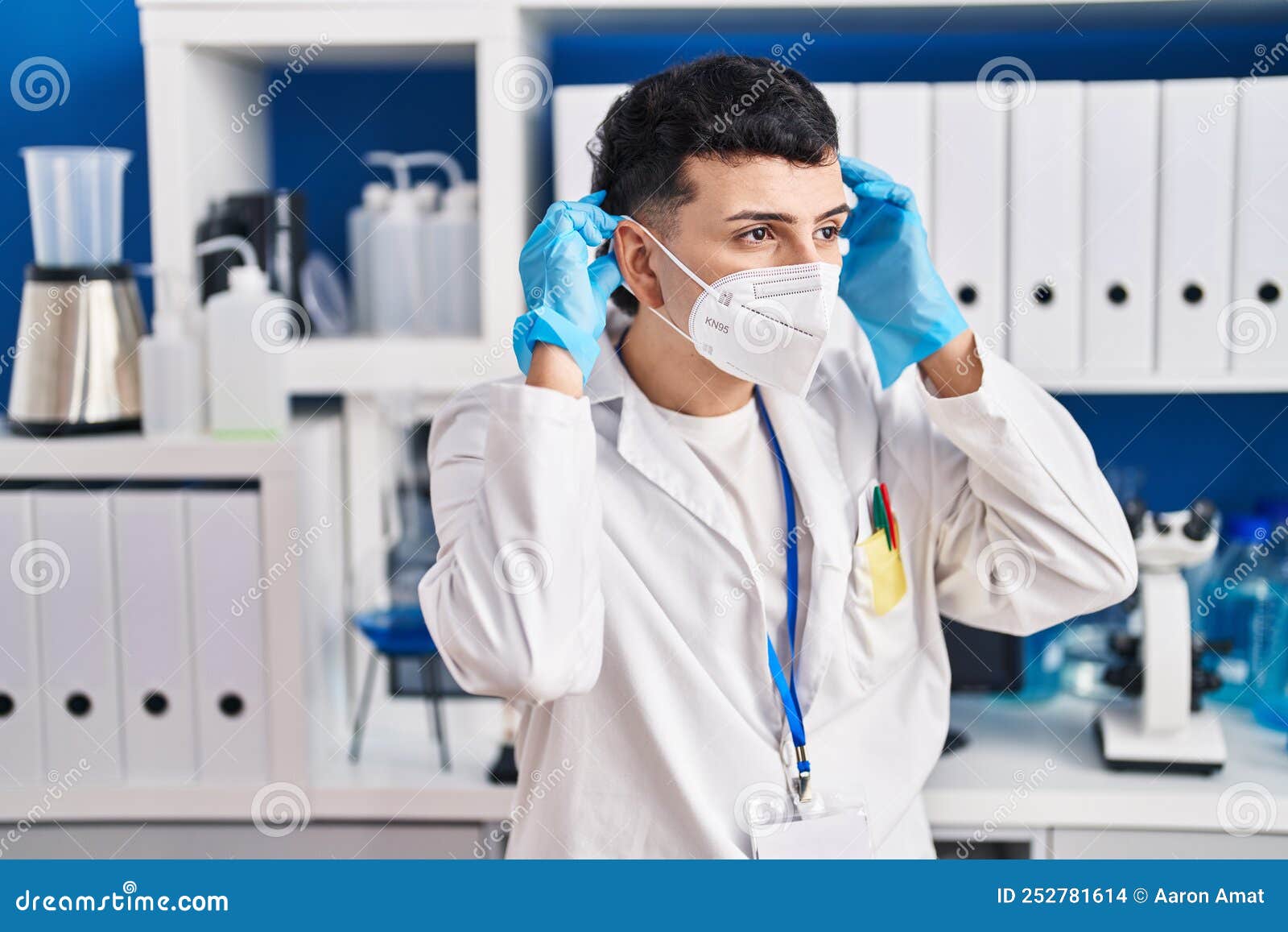 Young Non Binary Man Scientist Wearing Medical Mask at Laboratory Stock ...
